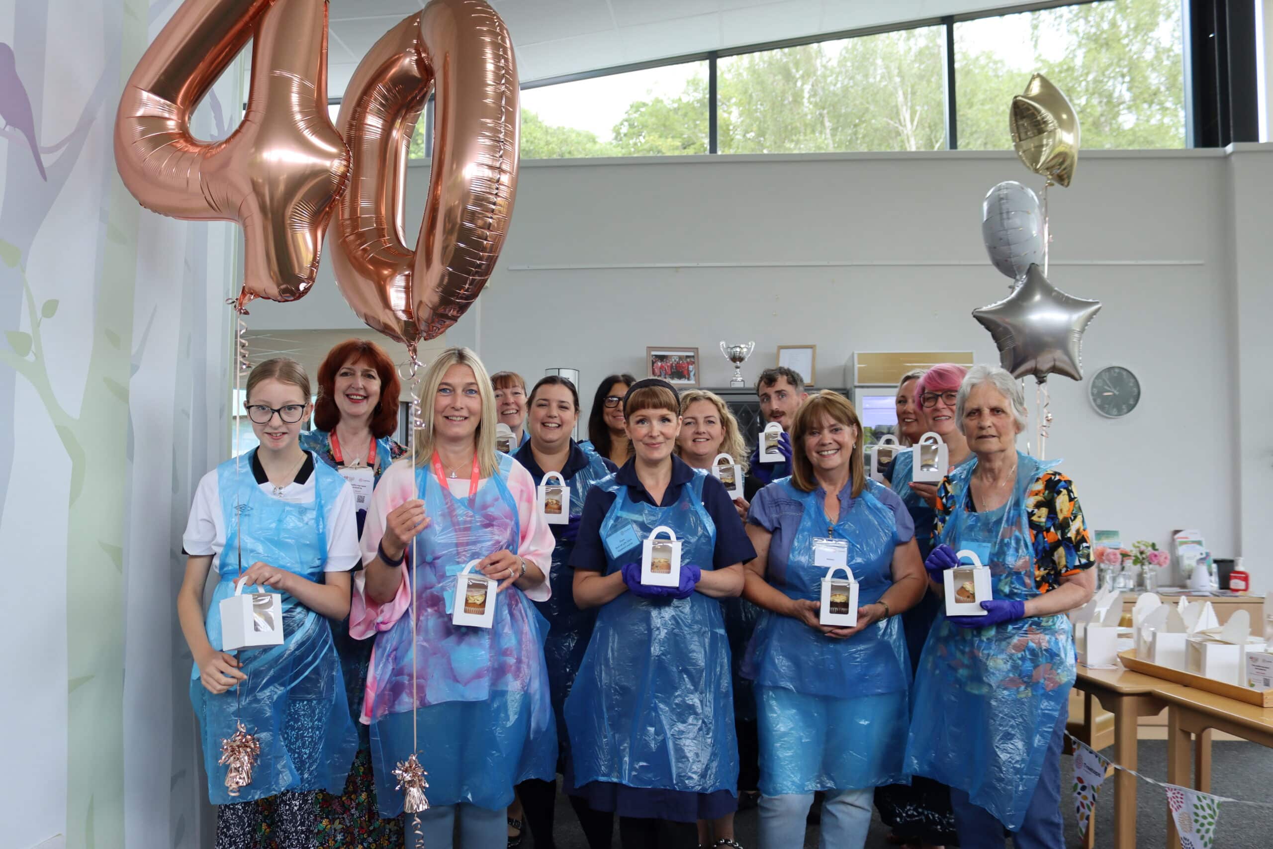 Patients, nurses and volunteers help ice 3,000 cakes as part of ...